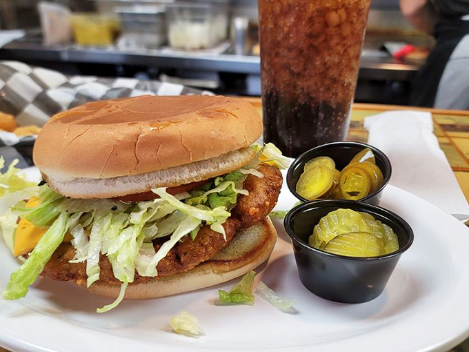 What started as a simple sandwich evolved into this masterpiece of crispy, juicy perfection, complete with those house-made pickles that could start their own fan club.