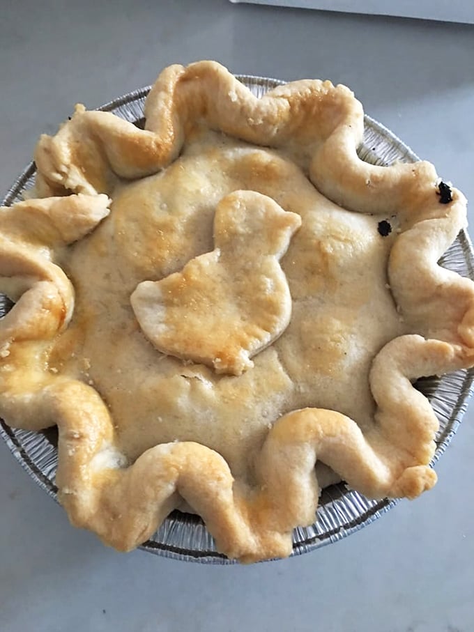 This isn't just chicken pot pie; it's comfort reincarnated as food, with a golden crust that crackles like autumn leaves.