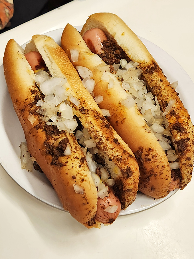 These aren't just hot dogs; they're edible history lessons, each one telling the story of Fort Wayne's love affair with perfectly spiced chili.