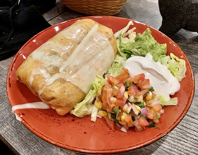 Golden-fried chimichangas draped in queso blanket, served with a colorful entourage of fresh pico, guacamole, and sour cream. Diet plans, beware.