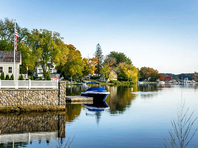 Tranquility perfected: Essex's waterfront reflects autumn trees in water so still you'd think Mother Nature pressed pause just for your Instagram moment.