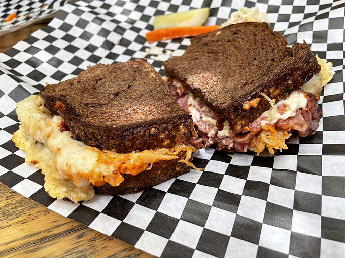 Behold the star of our show &ndash; layers of corned beef, sauerkraut, and Swiss cheese melting together in a sandwich romance that would make Shakespeare weep.