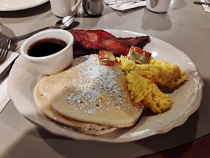 Pancakes dusted with powdered sugar, scrambled eggs that look like clouds, and bacon that means business&mdash;breakfast doesn't get more textbook perfect.