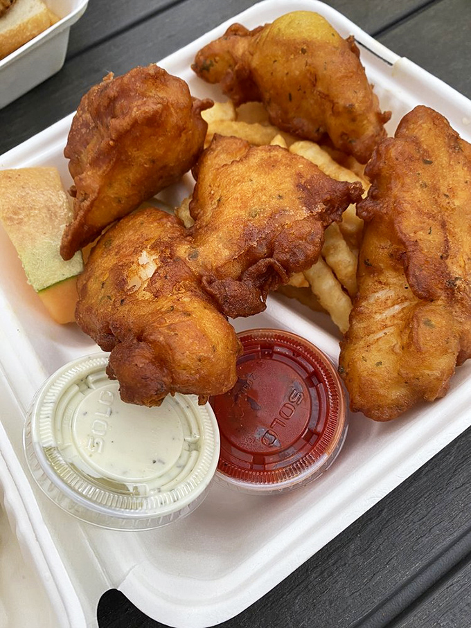 Golden-battered cod that shatters like dreams, paired with crispy fries. The kind of fish and chips that makes the British weep with envy.