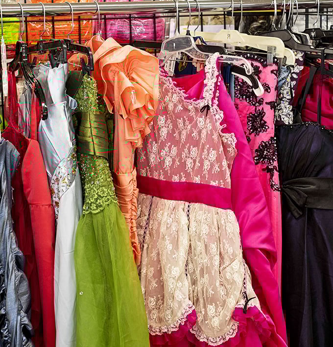 Formal gowns hang like colorful promises of second chances&mdash;from prom night revivals to costume parties waiting to happen.