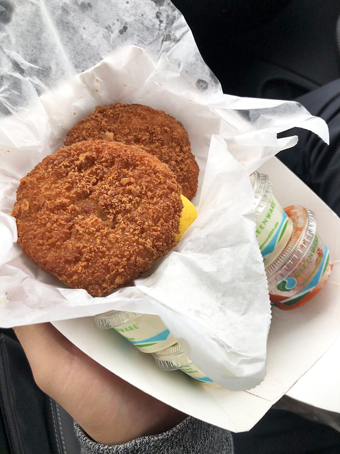 Golden-brown treasures from the deep. These crab cakes aren't just food&mdash;they're edible souvenirs from Neptune's kingdom, crispy outside and sweet within.