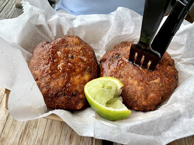 Golden-brown crab cakes that would make Maryland jealous, served with a lime wedge that's not just garnish&mdash;it's essential seasoning artillery.
