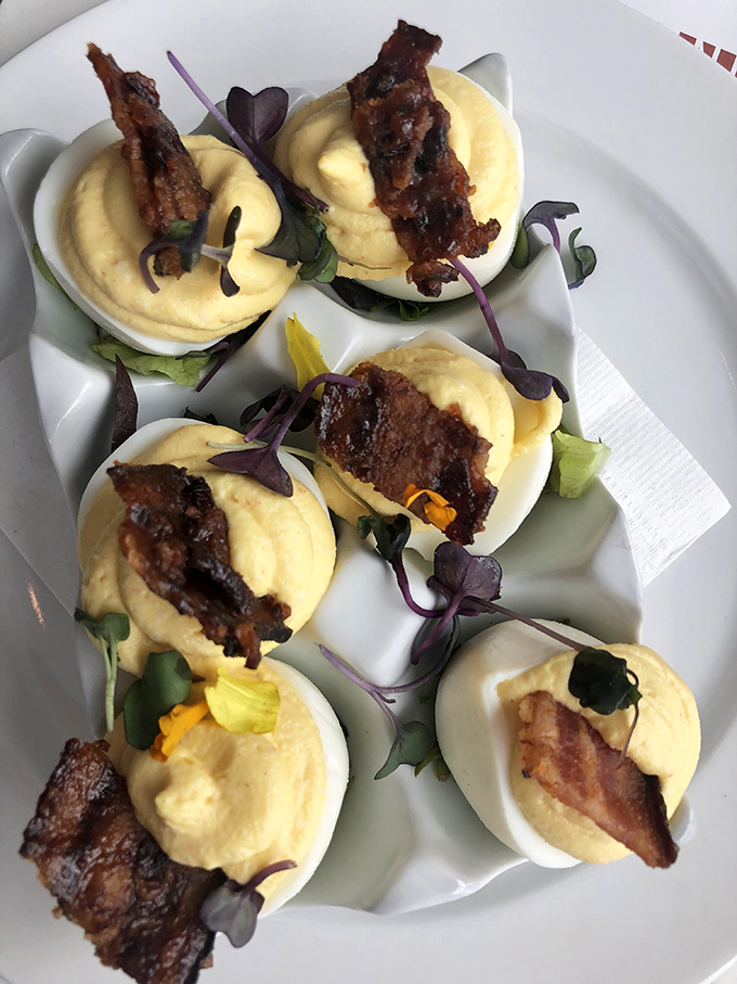 These aren't your aunt's potluck deviled eggs. Filberts elevates this humble appetizer to art form status with candied bacon that'll haunt your dreams. 