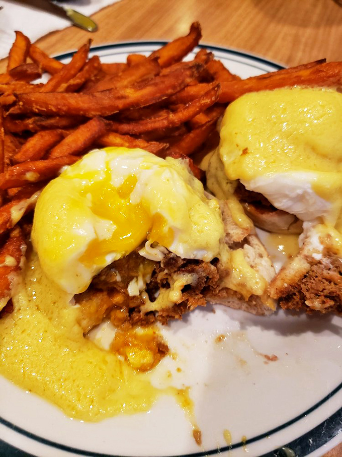 Eggs Benedict that doesn't just break the yolk, but breaks the mold. Those sweet potato fries aren't a side dish – they're co-stars.