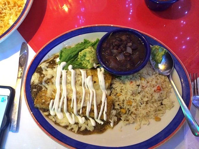 These enchiladas aren't just covered in sauce, they're swimming in it&mdash;the way all proper enchiladas should be, like Olympic athletes in a pool of flavor.