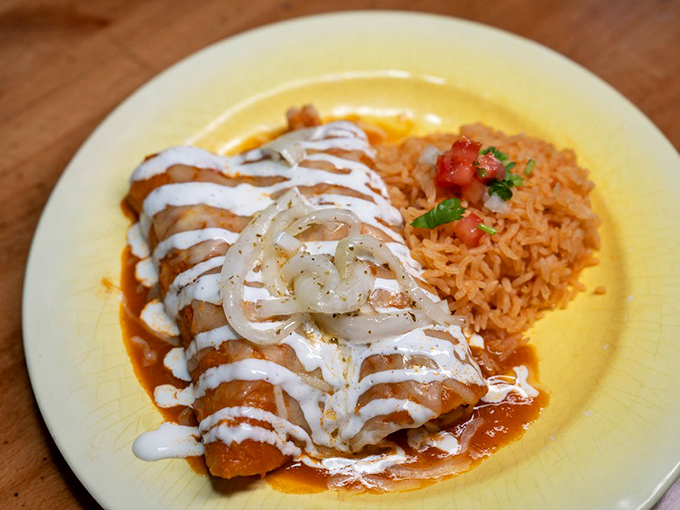 The loaded potato—Mexican comfort food that bypasses pretension for pure satisfaction. That dollop of crema is the exclamation point on a perfect sentence.
