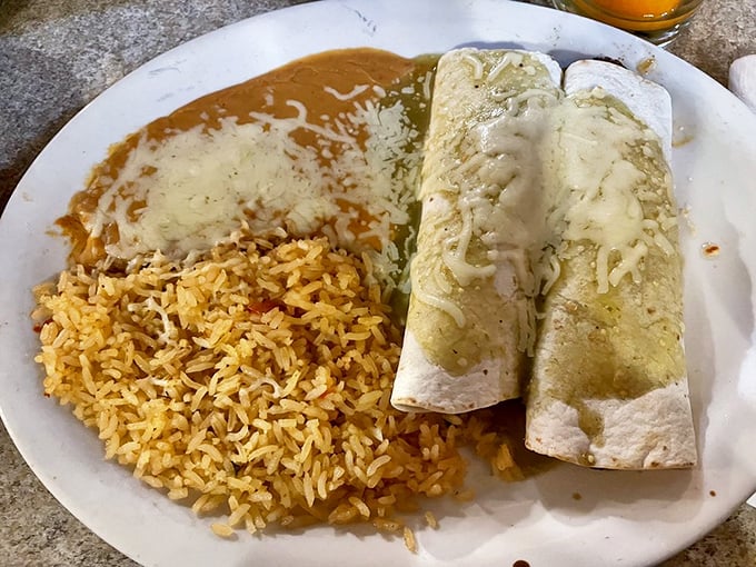 These enchiladas verdes suizas aren't just wrapped, they're embraced by tomatillo sauce and melted cheese&mdash;a perfect marriage that would make any Swiss-Mexican proud.