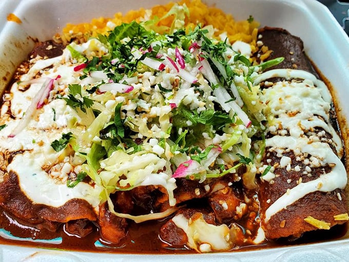 These enchiladas aren't just draped in sauce&mdash;they're wearing a royal robe of mole, crowned with fresh herbs and a drizzle of crema fit for Mexican royalty.