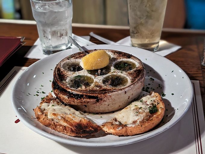 Escargot swimming in garlic butter&mdash;proof that sometimes the best seafood isn't seafood at all. Your bread basket will thank you for the dipping opportunity.