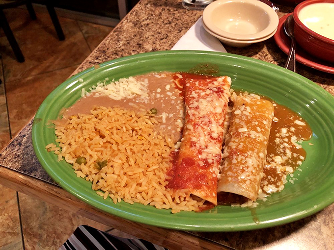 Two sauces, two enchiladas, one revelation. This plate demonstrates the beautiful simplicity of perfect execution over flashy presentation.
