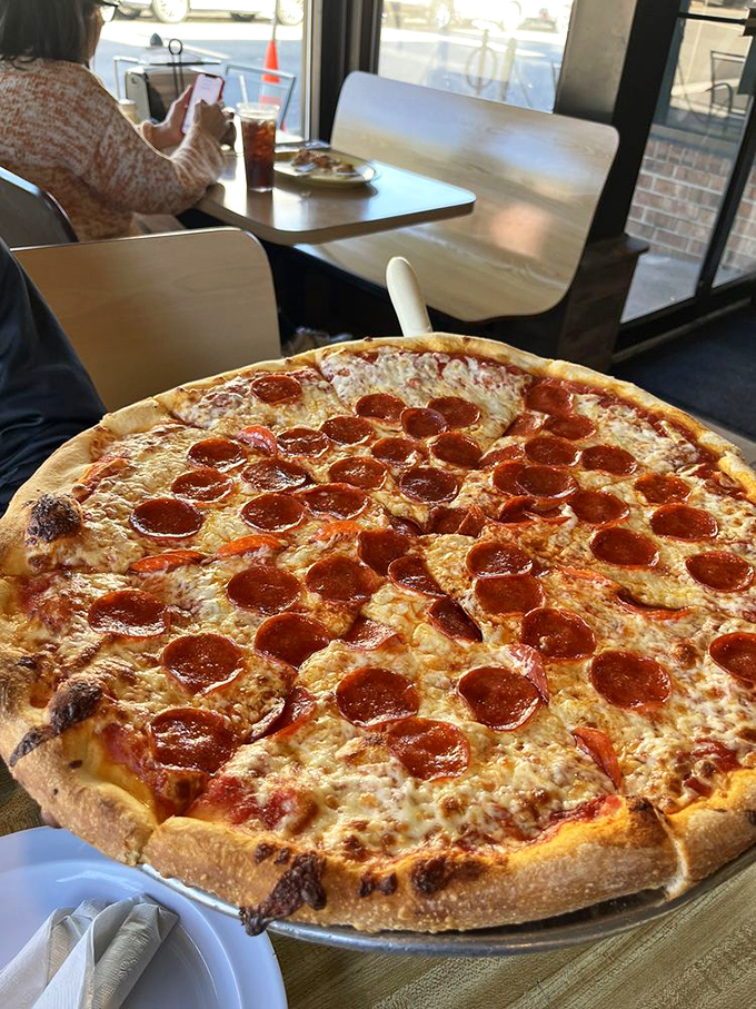 This pepperoni pizza isn't just a meal, it's a religious experience&mdash;crispy-edged crust, bubbling cheese, and pepperoni that curls into little flavor cups.