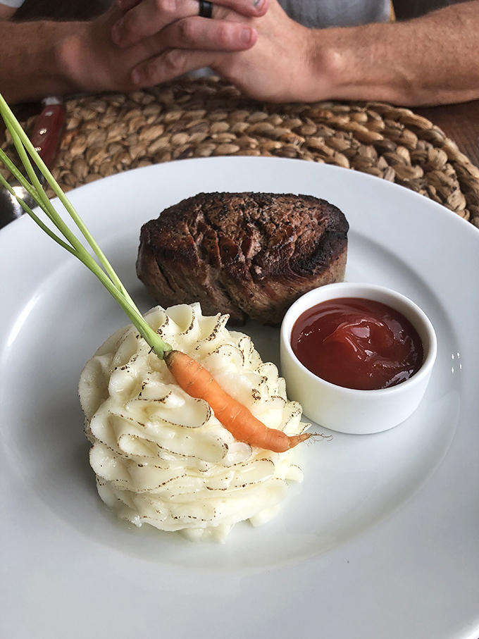 This filet mignon isn't just cooked&mdash;it's been sweet-talked to perfection, accompanied by mashed potatoes sculpted like they're auditioning for an art show.