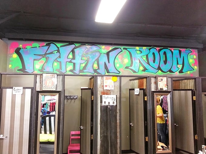 The "Fittin Room" graffiti art signals where fashion dreams meet reality. Like a confessional booth for your style aspirations, minus the guilt.