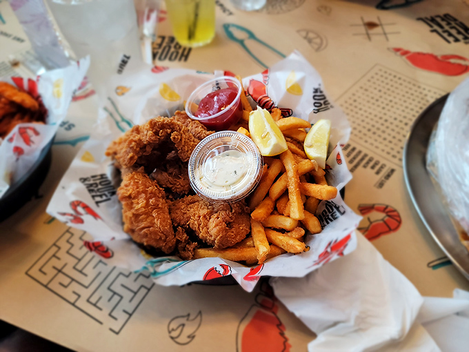 Golden-fried catfish that shatters with each bite, paired with crispy fries&mdash;proof that sometimes the simplest pleasures are the most profound.