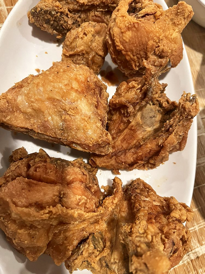 Golden-brown perfection that makes you want to high-five the chef. This isn't just fried chicken—it's edible Indiana heritage on a plate.