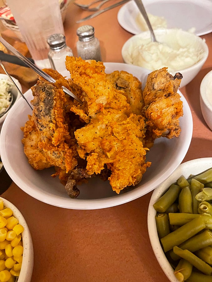 Golden-brown perfection that makes time stand still. This isn't just fried chicken&mdash;it's edible poetry with a crispy, seasoned crust hiding juicy treasures beneath.