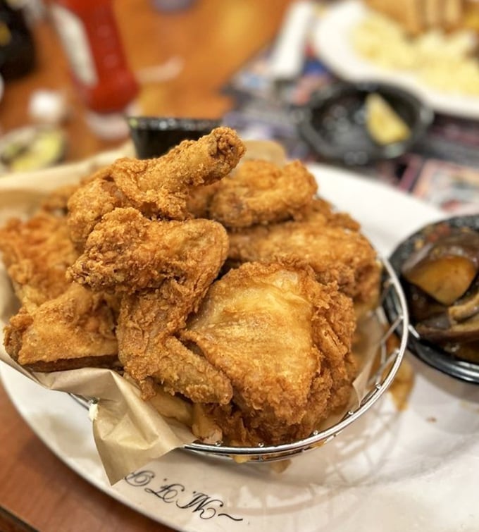 Golden-brown fried chicken that would make your grandmother both jealous and proud. The perfect balance of crispy exterior and juicy interior.