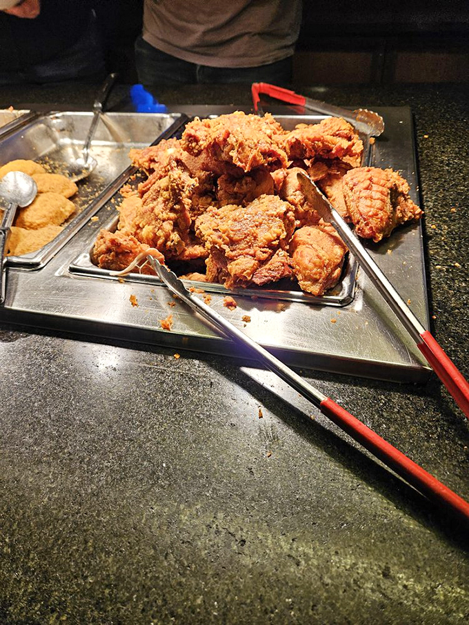 Golden-brown pieces of fried chicken stacked like delicious Jenga blocks. One wrong move and you'll be forced to eat the evidence.