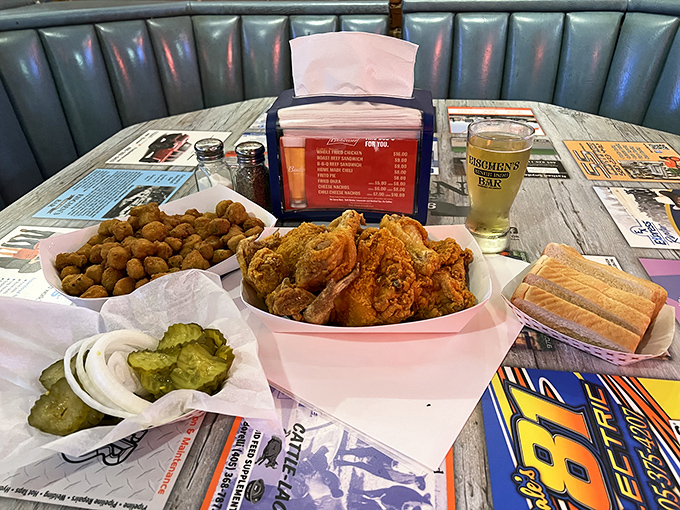 The holy trinity of comfort food: golden fried chicken, crispy okra, and those essential pickles. Napkins required, diet resolutions suspended.