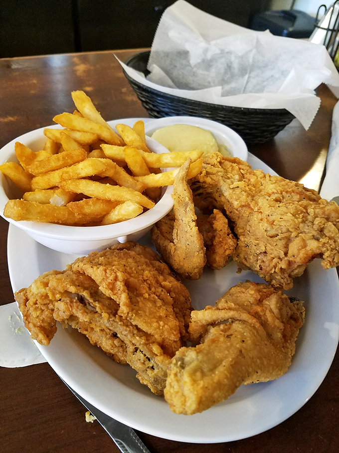 Golden-brown perfection that makes Colonel Sanders weep with inadequacy. That first crunch should be measured on the Richter scale of culinary satisfaction.