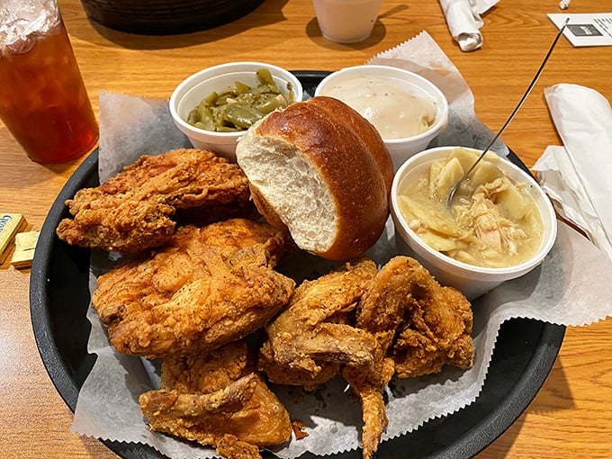 Golden-brown chicken that crackles at first bite, paired with sides that understand their supporting role in this delicious drama.