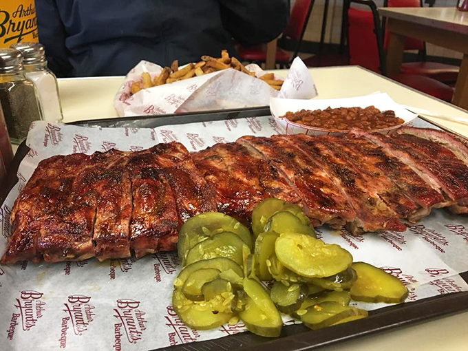 Dinosaurs looked at these ribs and felt inadequate. Perfectly crusted exterior, tender pink interior, and pickles providing the acidic counterpoint to meat magnificence.