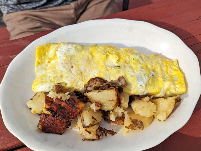 This omelet doesn't need Instagram filters&mdash;it's the real deal. Perfectly folded eggs with home fries that have achieved that mythical crispy-yet-tender status.