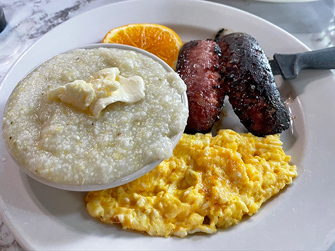 Grits done right&mdash;creamy, buttery, and accompanied by sausage links that snap with each bite. This is breakfast's holy trinity.