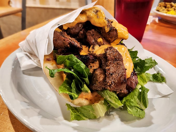 This isn't fast food&mdash;it's slow food served quickly. Tender meat, vibrant sauce, fresh greens, all embraced by a pillowy pita that's doing the Lord's work.