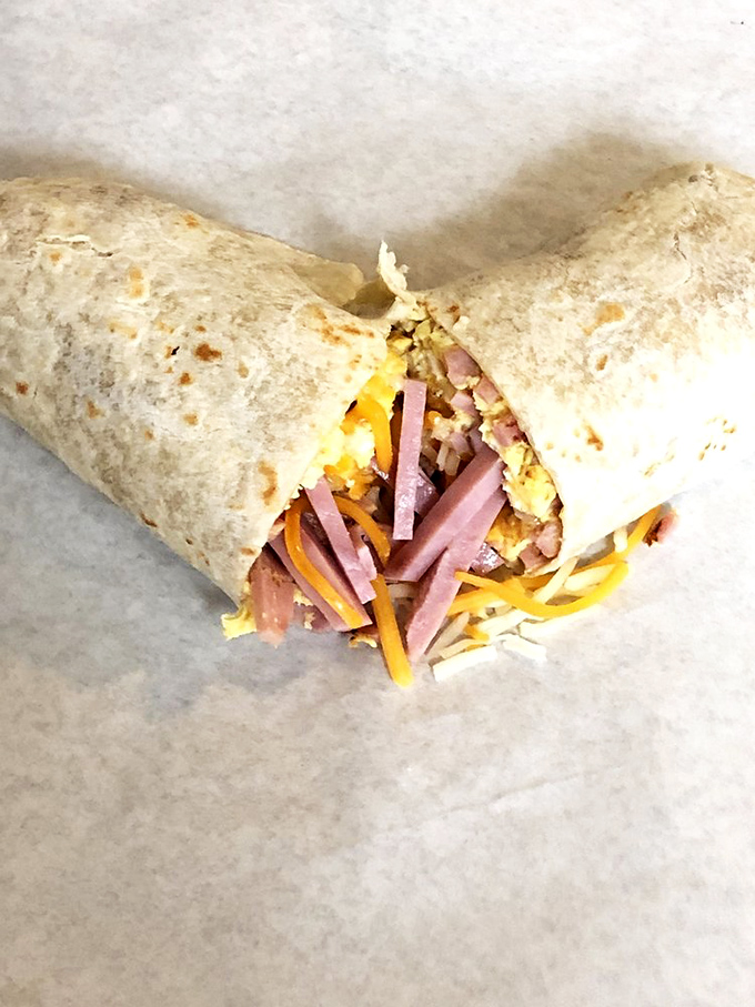 This loaded breakfast burrito doesn't care what time your watch says&mdash;it's always the right moment for eggs, ham, and cheese wrapped in tortilla bliss.