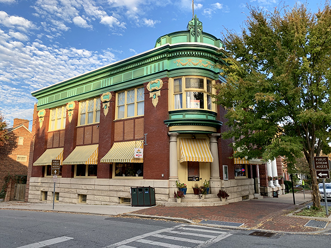 This architectural gem with its mint-green copper trim whispers tales of bygone prosperity while still serving the community.