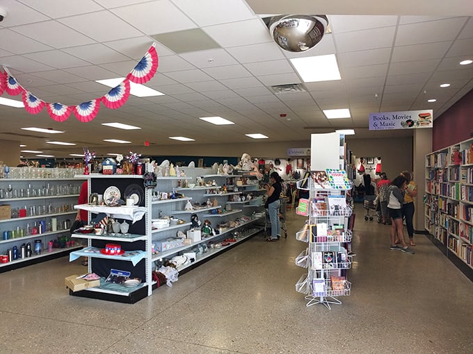 The housewares section is a mismatched paradise where vintage Pyrex meets modern mugs, creating a timeline of American kitchen history on a single shelf. 