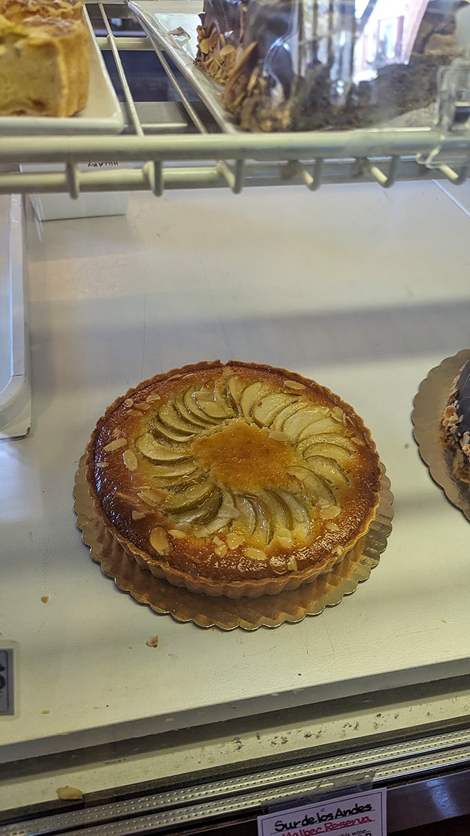 This apple tart isn't just dessert&mdash;it's edible architecture. Those perfectly arranged slices create a spiral that would make Fibonacci himself reach for a fork.