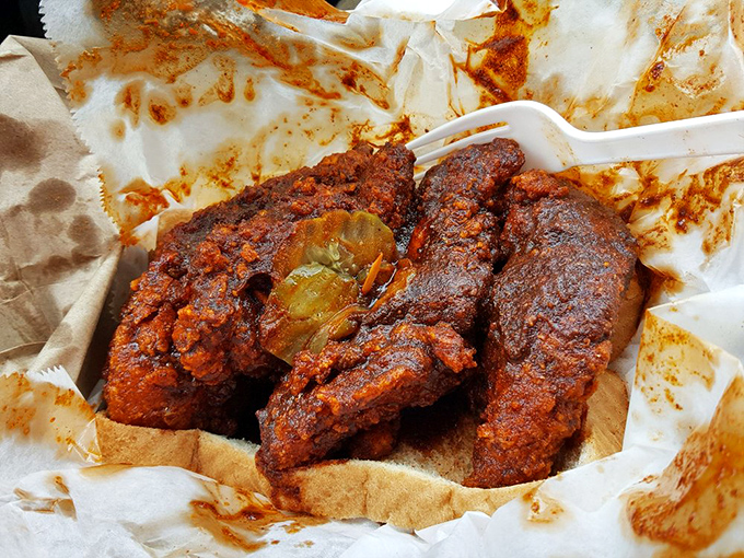 This isn't just chicken; it's Nashville history on a plate. That deep russet color isn't for show&mdash;it's a promise of the flavor explosion to come.