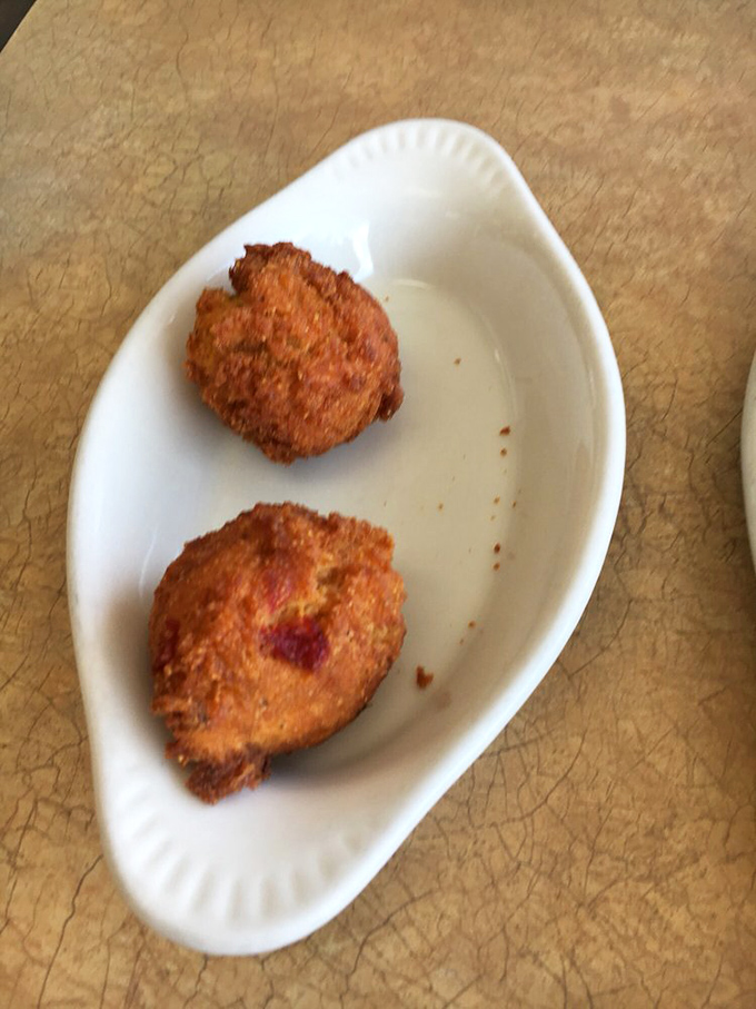 Golden-fried perfection! These hush puppies aren't just good "for Oklahoma" – they're good enough to make a New Orleans chef question their life choices.