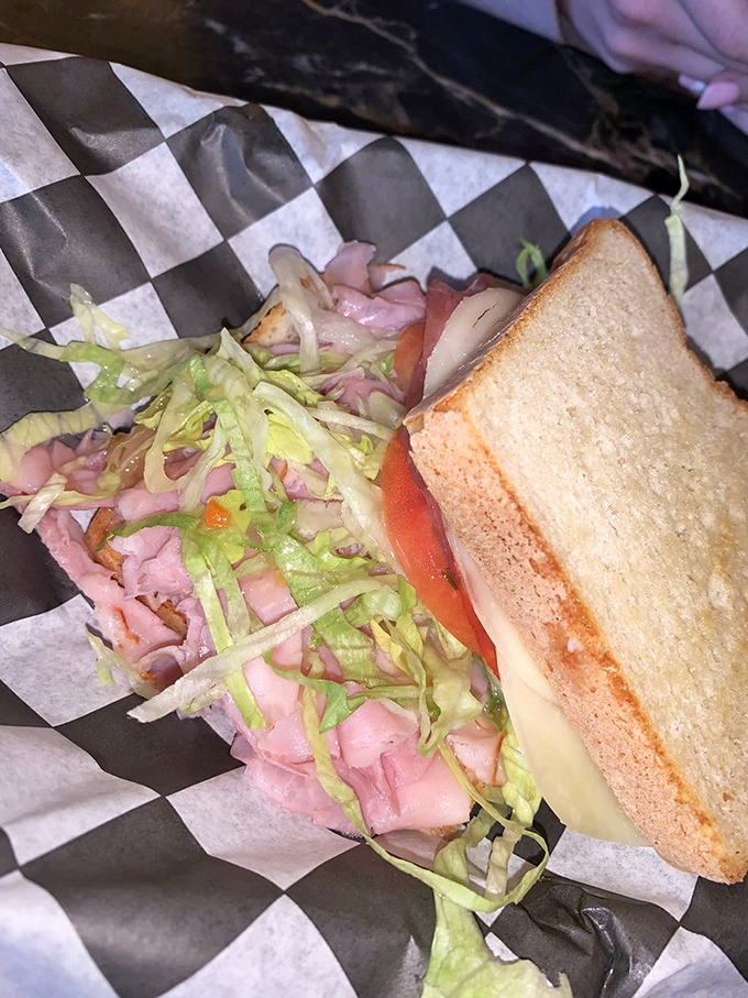 This isn't just a sandwich; it's a masterpiece of bacon, cheese, and perfectly grilled bread that makes fast food weep with inadequacy.