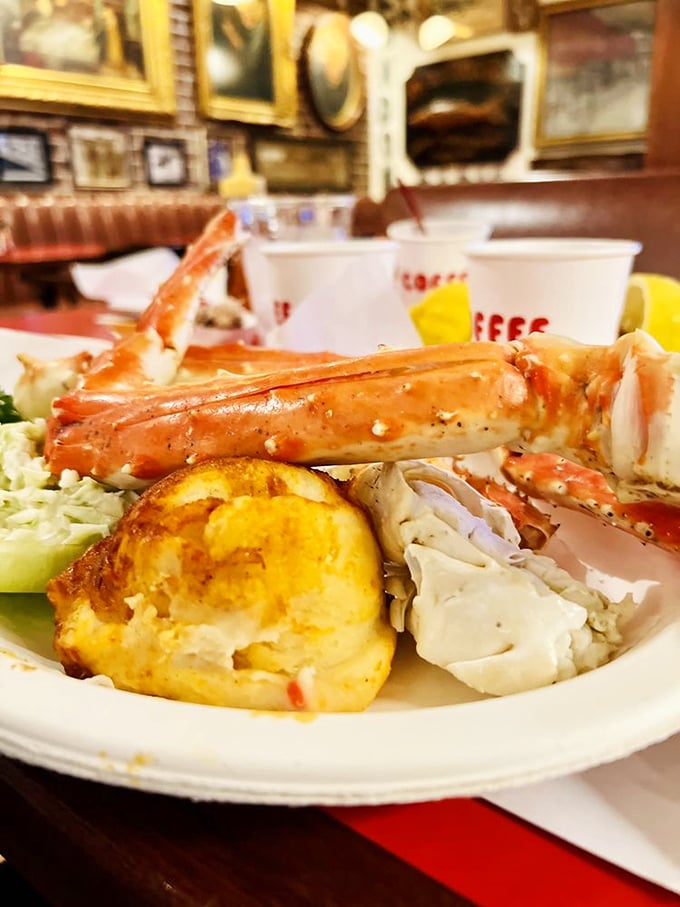 King crab legs so impressive they deserve their own ZIP code. Served on paper plates because fancy dishware would just slow down the feast.