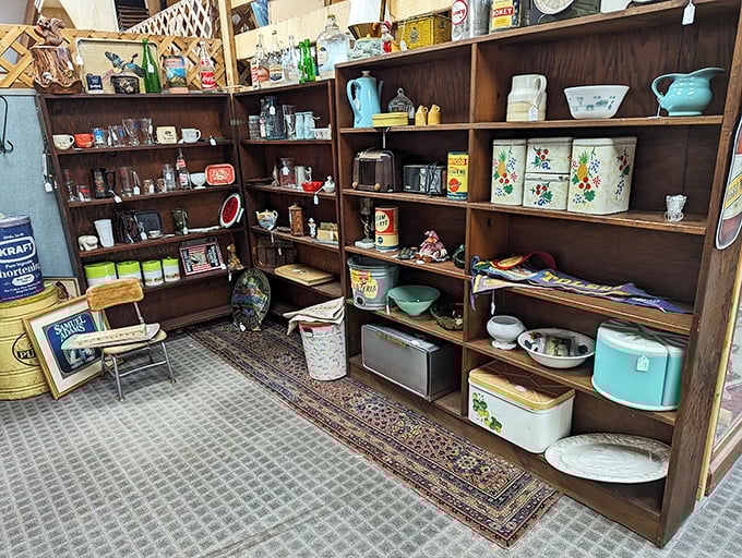 Vintage kitchen displays that make modern appliances look soulless by comparison. That turquoise Pyrex might just change your entire baking philosophy.