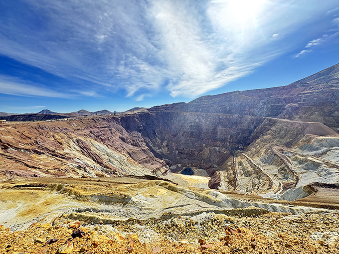 The Lavender Pit stands as nature's amphitheater, a massive reminder of Bisbee's copper mining heyday that's both beautiful and slightly terrifying.