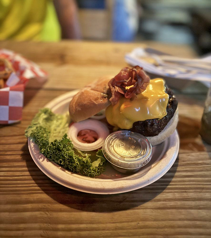 Behold, the burger that launched a thousand road trips. That melty cheese cascade isn't just photogenic&mdash;it's practically performing a siren song.