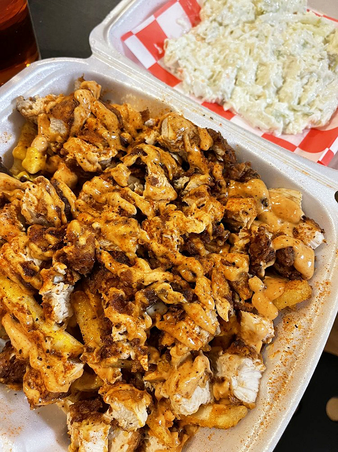 Loaded fries that don't mess around. The chicken-to-fry ratio here suggests someone in the kitchen understands life's true priorities.