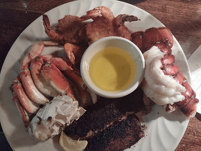 Ocean's bounty on a plate: succulent crab legs and perfectly cooked lobster tail that might make you forget you're 300 miles from the coast.