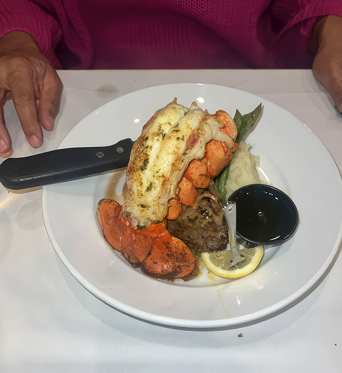 A lobster tail that makes you wonder if mermaids might be onto something. Perfectly split, buttered, and ready for its close-up&mdash;and your fork.