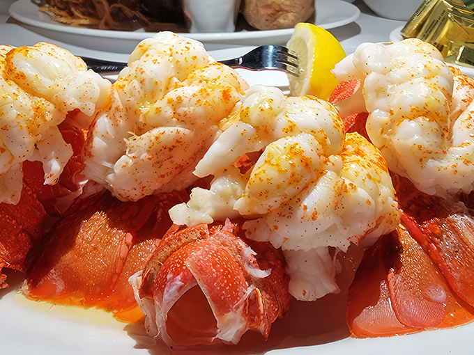 These lobster tails aren't just seafood; they're crimson crowns of oceanic royalty, dusted with spice and demanding your undivided attention.