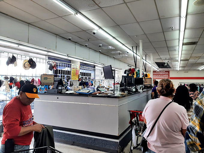 The checkout line, where strangers become comrades in arms, united by the shared triumph of successful treasure hunting.